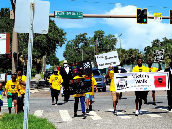 Marching for positivity: 100+ Black Men hold third annual Victory Walk
